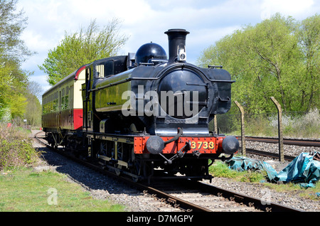 GWR 0-6-0 pannier tank steam locomotive No. 7752 on low loader lorry at ...