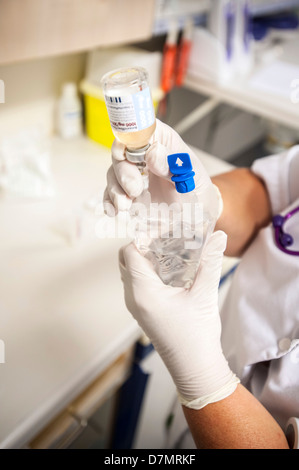 Preparing hospital drugs. Close-up of a hospital nurse preparing ...