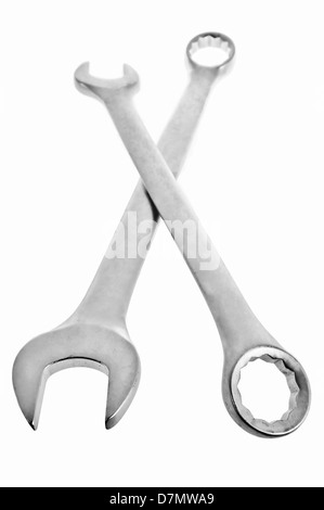 Two crossed wrenches on a white lie Stock Photo - Alamy
