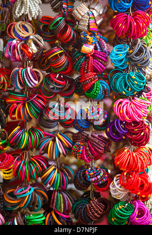 Colorful Bangles on a Market stall rack Stock Photo - Alamy