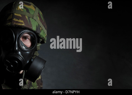 British soldier wearing a gas mask and protective suit in 1940 Stock ...