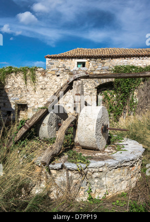An old and ruined olive press at Trachila in the outer Mani Messinia ...