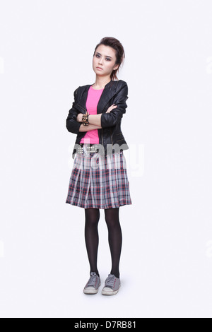 Full length portrait of a punk girl walking isolated on white ...