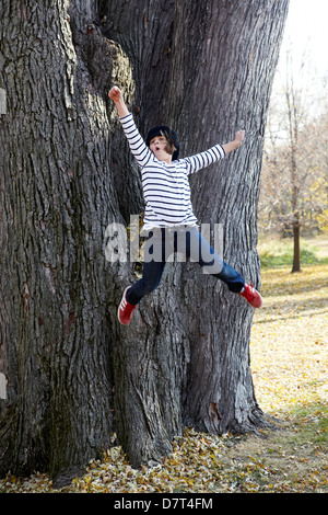 Girl yelling at the tree Stock Photo - Alamy