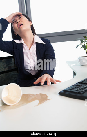 spilling coffee in cup Stock Photo - Alamy
