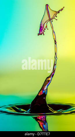 A water drop ripple on turquoise background Stock Photo - Alamy