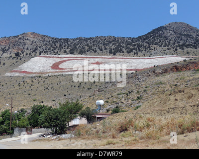 NORTH CYPRUS Massive flag on south side of Besparmak range facing ...