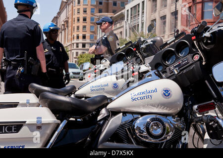 Homeland Security Police officer standing next to cruiser - Washington ...