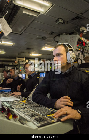 Royal Navy operators inside the main operations room onboard HMS ...