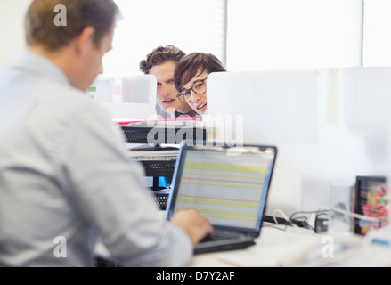 Office worker eavesdropping Stock Photo - Alamy