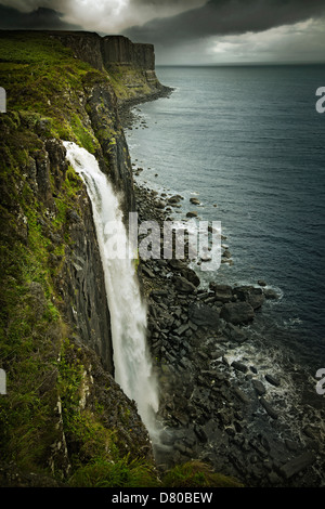 Waterfall over cliff into the sea The Kilt Rock Isle of Skye Scotland ...