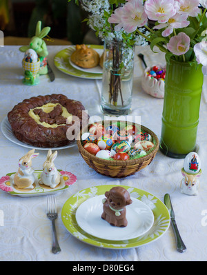 Easter Bunny cake. paper bunnies and flowers for Easter cake on a ...