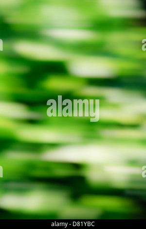 Green defocused dynamic abstract background. Long time exposure motion ...