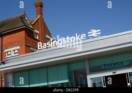 Basingstoke sign, atop the railway station. Basingstoke is a town in ...