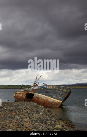 Fishing boat 'Flowing Stream' beached on the banks of Loch Vatten, nr ...