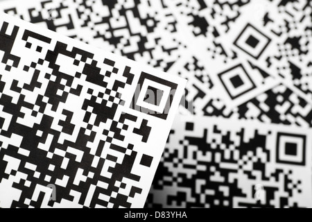 Detail of a few QR codes printed on paper Stock Photo - Alamy