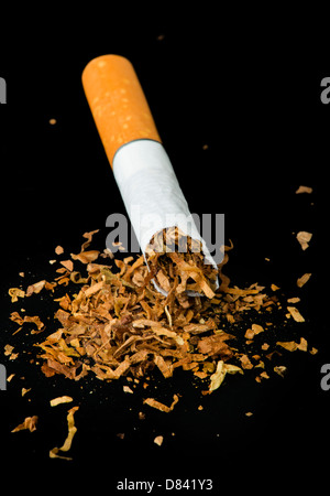 Crumpled cigarette and tabaco Stock Photo - Alamy