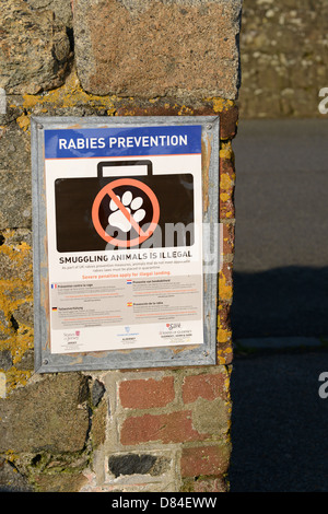 Rabies prevention warning sign Stock Photo - Alamy