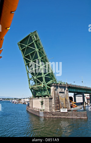 This is the Fremont drawbridge in Seattle, WA, lifted up from Lake ...