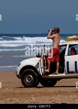 Life guard man on the beach Stock Photo - Alamy