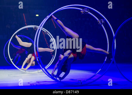 Gymnasts perform a wheel gymnastics exercise during the German wheel ...