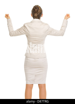 Rear view of angry business woman in audience at presentation disrupted ...