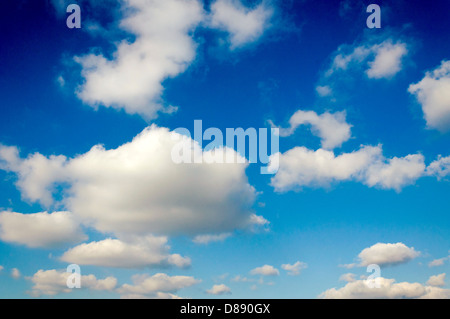 Relaxing view on fluffy white clouds on a deep blue sky Stock Photo - Alamy