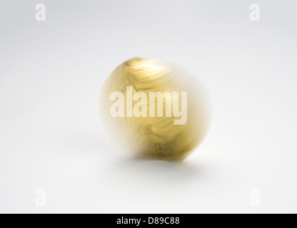 A spinning British pound coin Stock Photo - Alamy
