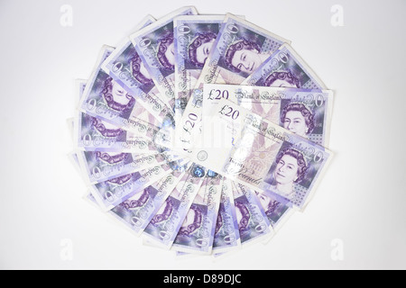 Stack of £20 pound notes on white background Stock Photo - Alamy