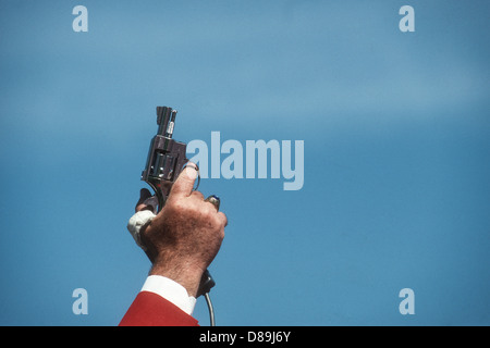Detail of f track and field relay starter's pistol Stock Photo - Alamy