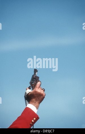 Detail of f track and field relay starter's pistol Stock Photo - Alamy