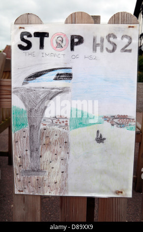A child's hand drawn "Stop HS2" posters on a fence in Wendover ...