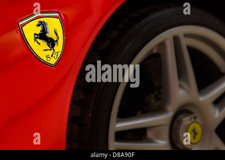 The symbol of the Ferrari brand is the Cavallino Rampante, a black ...