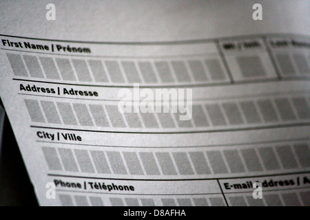Filling out a form with personal information. Documents in a folder on ...