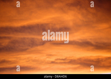 Stunning sunset scenery with orange-purple cloudy sky Stock Photo - Alamy
