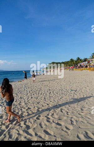 The White Beach near Puerto Galera on Mindoro Island, Philippines Stock ...