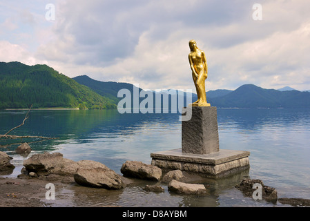 Statue of Tatsuko watching over Lake Tazawa in Autumn Stock Photo - Alamy