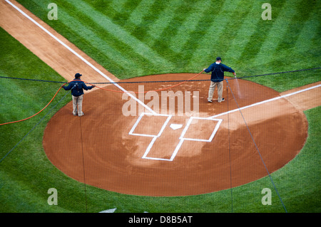 Prepping the baseball field Stock Photo - Alamy