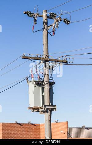 11 kV. overhead electrical power lines and transformer on wooden pole ...