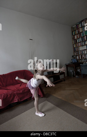 Girl in living room ballet dancing Stock Photo - Alamy