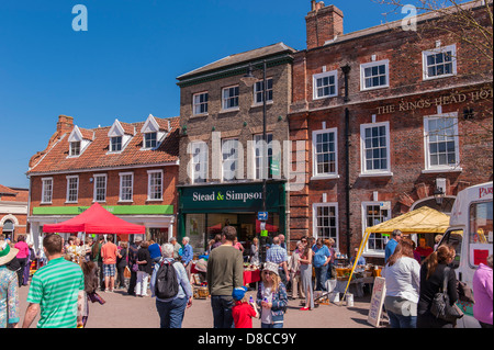 An antiques fair in the town centre of Beccles , Suffolk , England ...