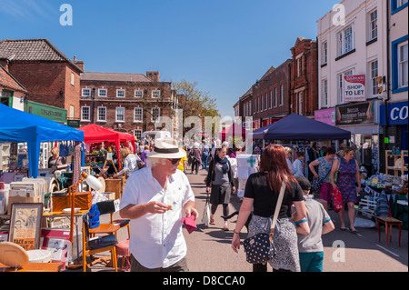 An antiques fair in the town centre of Beccles , Suffolk , England ...
