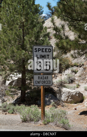 Speed limit sign. American radar enforced speed limit Stock Photo - Alamy