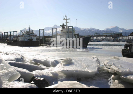 Ships preparing to break ice on water Stock Photo - Alamy