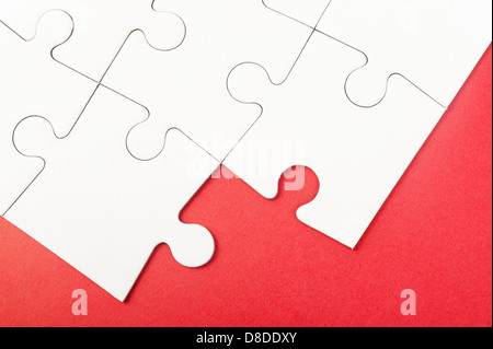 Group of white paper jigsaw puzzles Stock Photo - Alamy