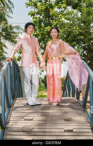 Female hand in suit holding tablet with no wallpaper Stock Photo - Alamy