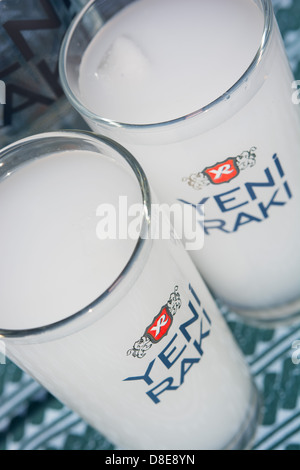 Glasses of Turkish raki (a popular aniseed-flavoured spirit, known ...