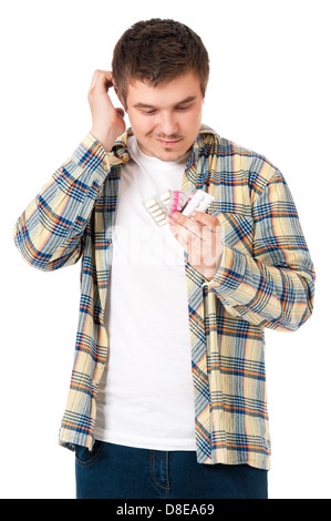Confused young man looking at an engagement ring and has doubts Stock ...