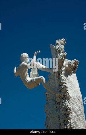 Statue of professional surfer Kelly Slater outside Ron Jon surf shop on ...