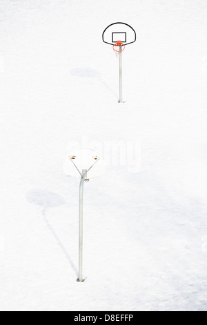 Views of snow on the outdoor basketball court in Clissold Park, Hackney ...